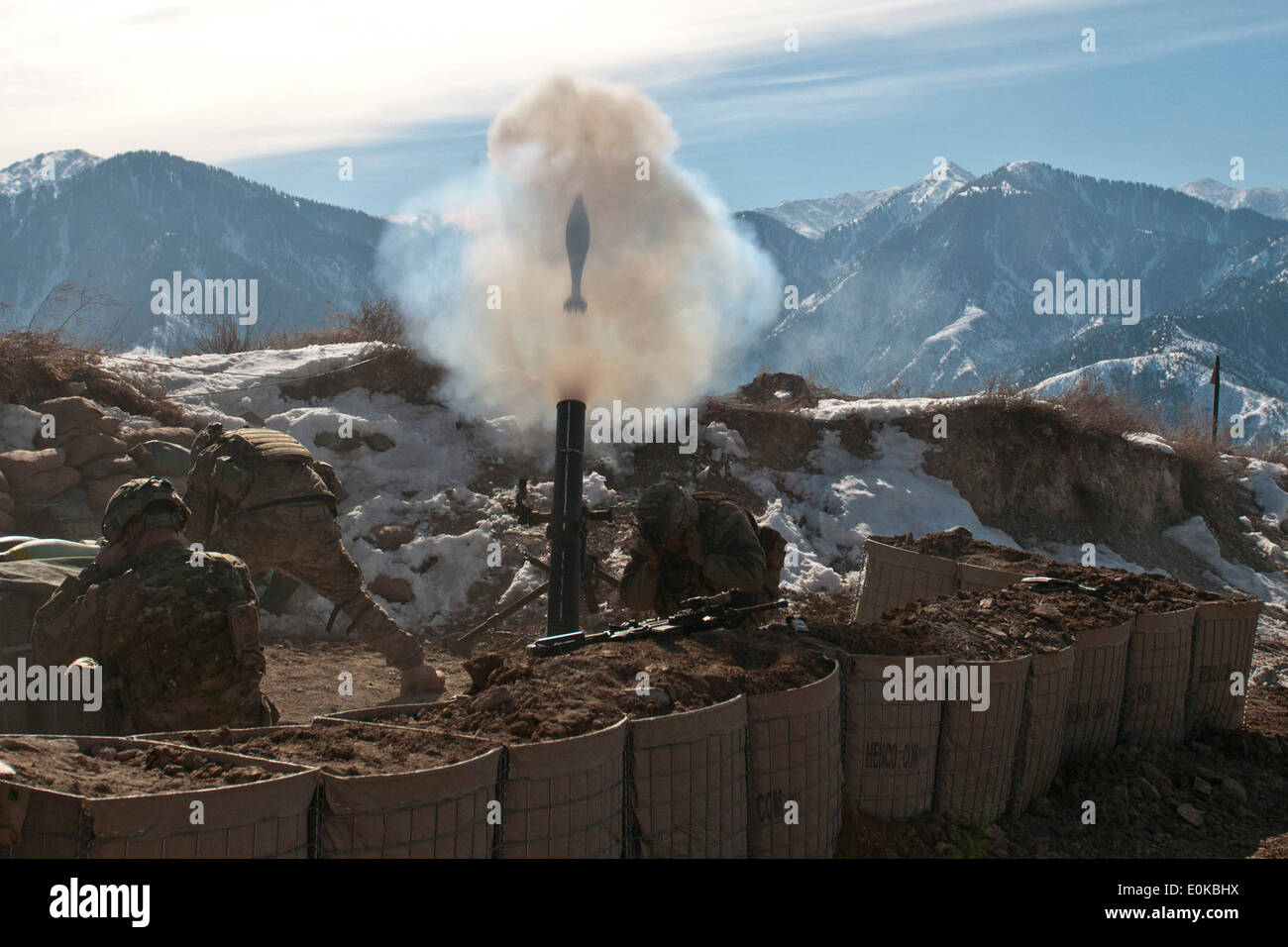 KUNAR PROVINCE, Afghanistan – A 120mm mortar round flies out of the ...