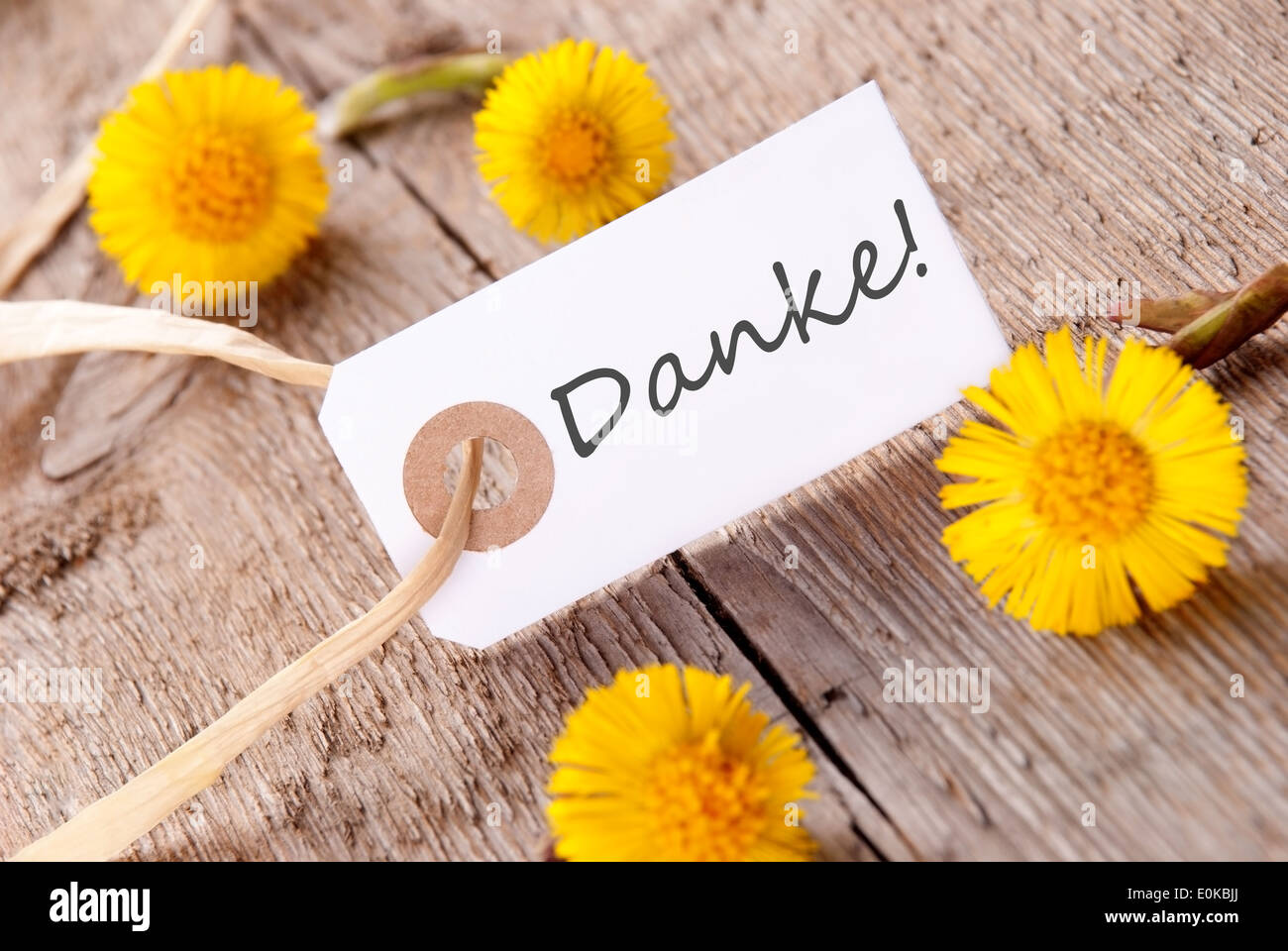 The German Word Danke, which means Thanks, on a white Banner with ...