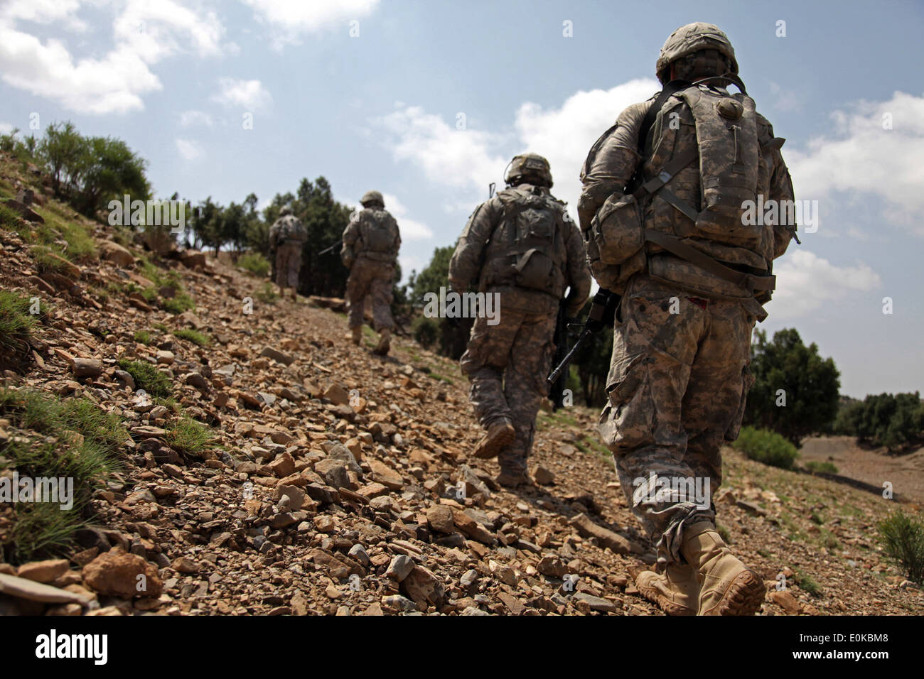 U.S. Army Soldiers patrol an area near the village of Kowtay, Khowst ...