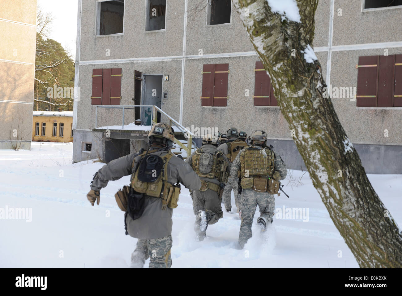 On 15 Feb 2010, Special Forces Soldiers storm towards the entrance of a ...