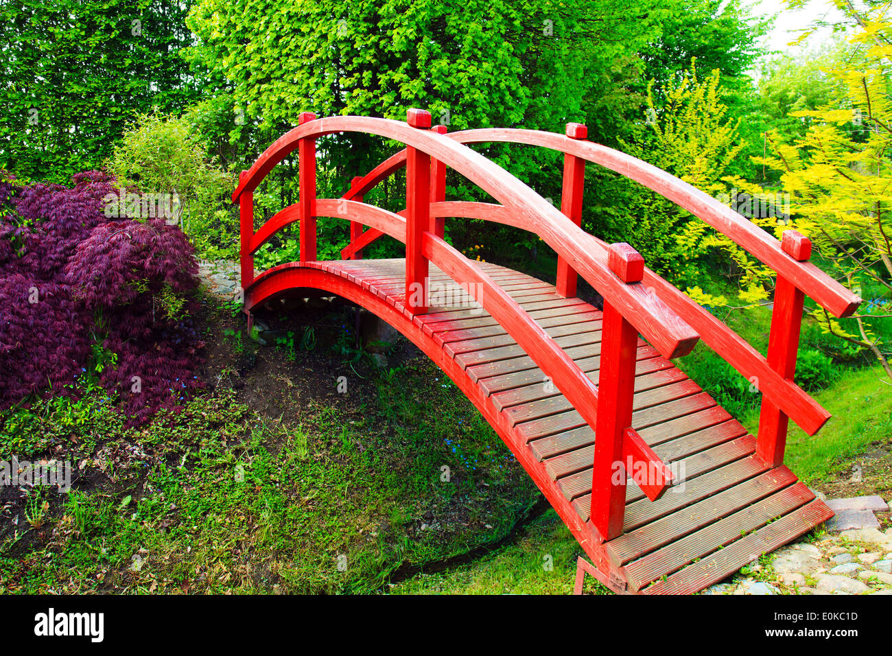 Red Bridge at the Japanese garden Stock Photo - Alamy
