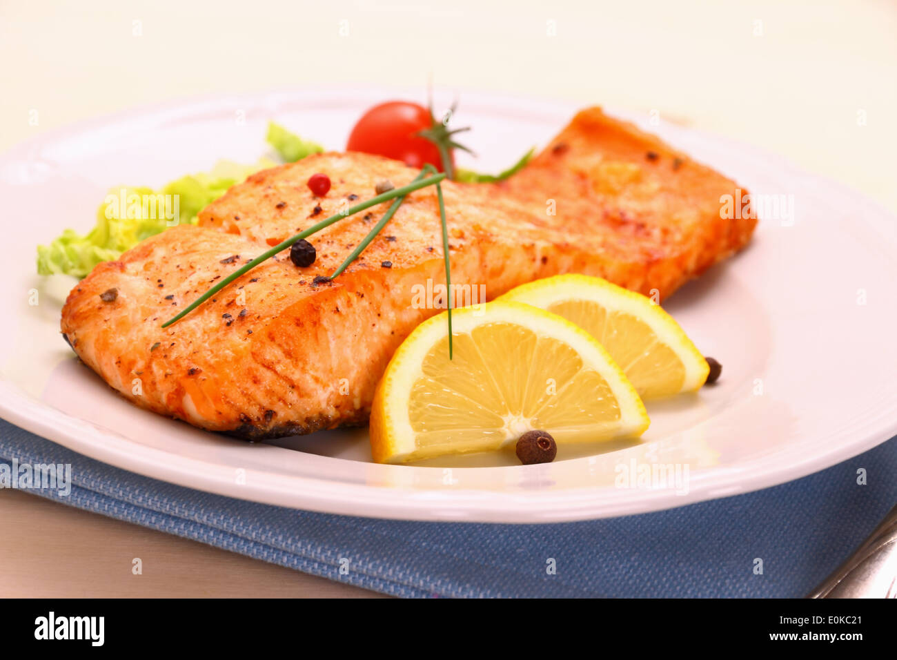 Grilled salmon, lemon and vegetables, top view Stock Photo - Alamy