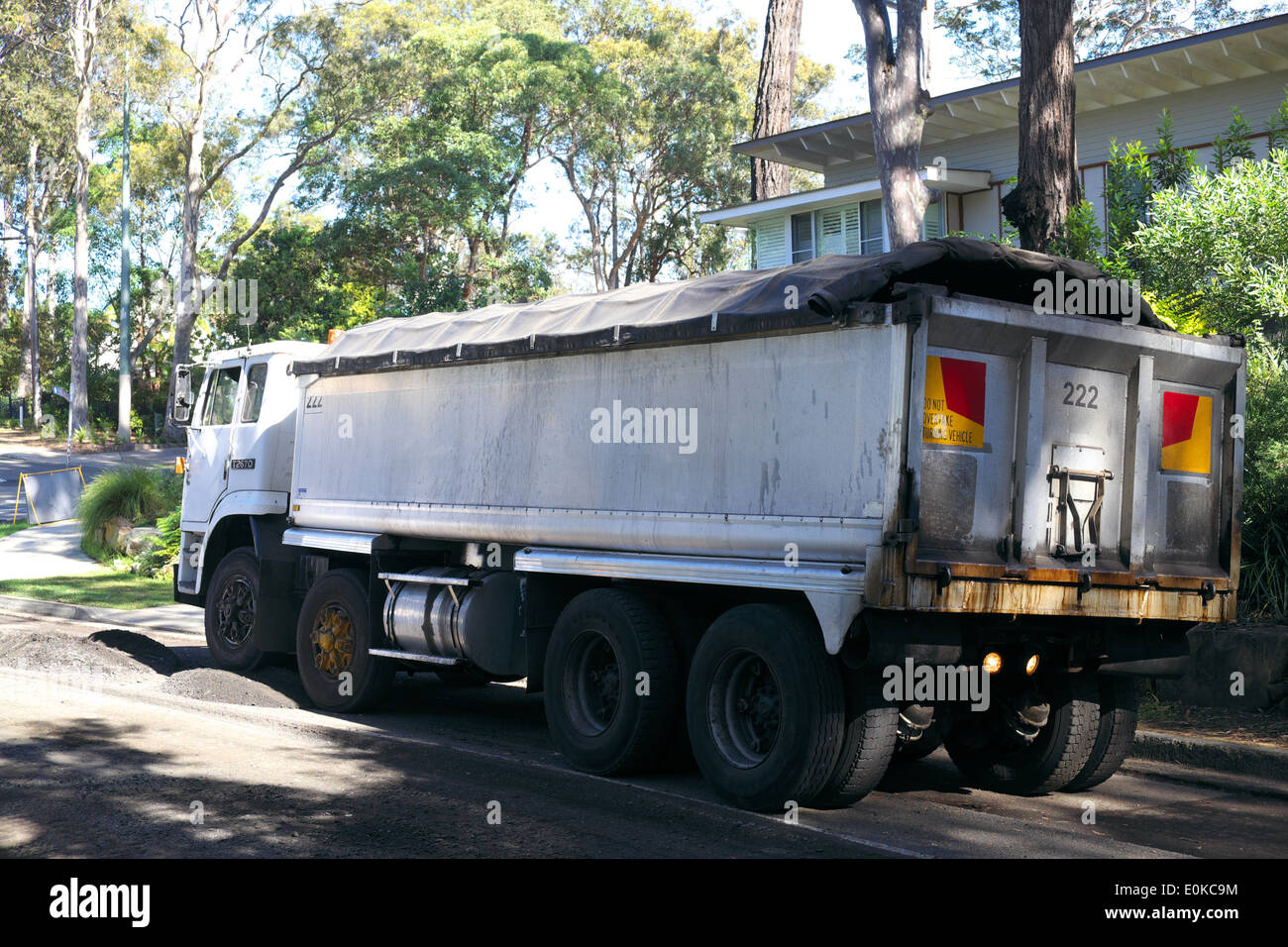 road resurfacing works in progress in a street in sydney,australia ...