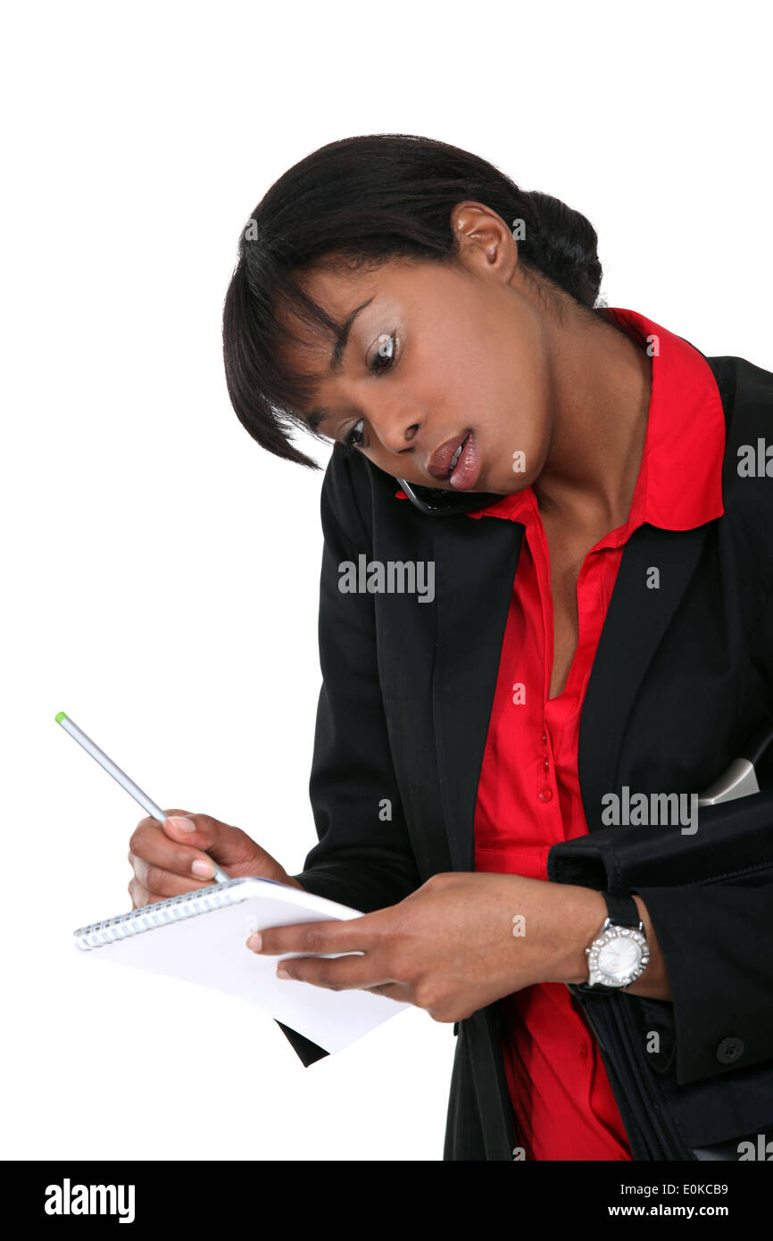 Secretary on the phone Stock Photo - Alamy