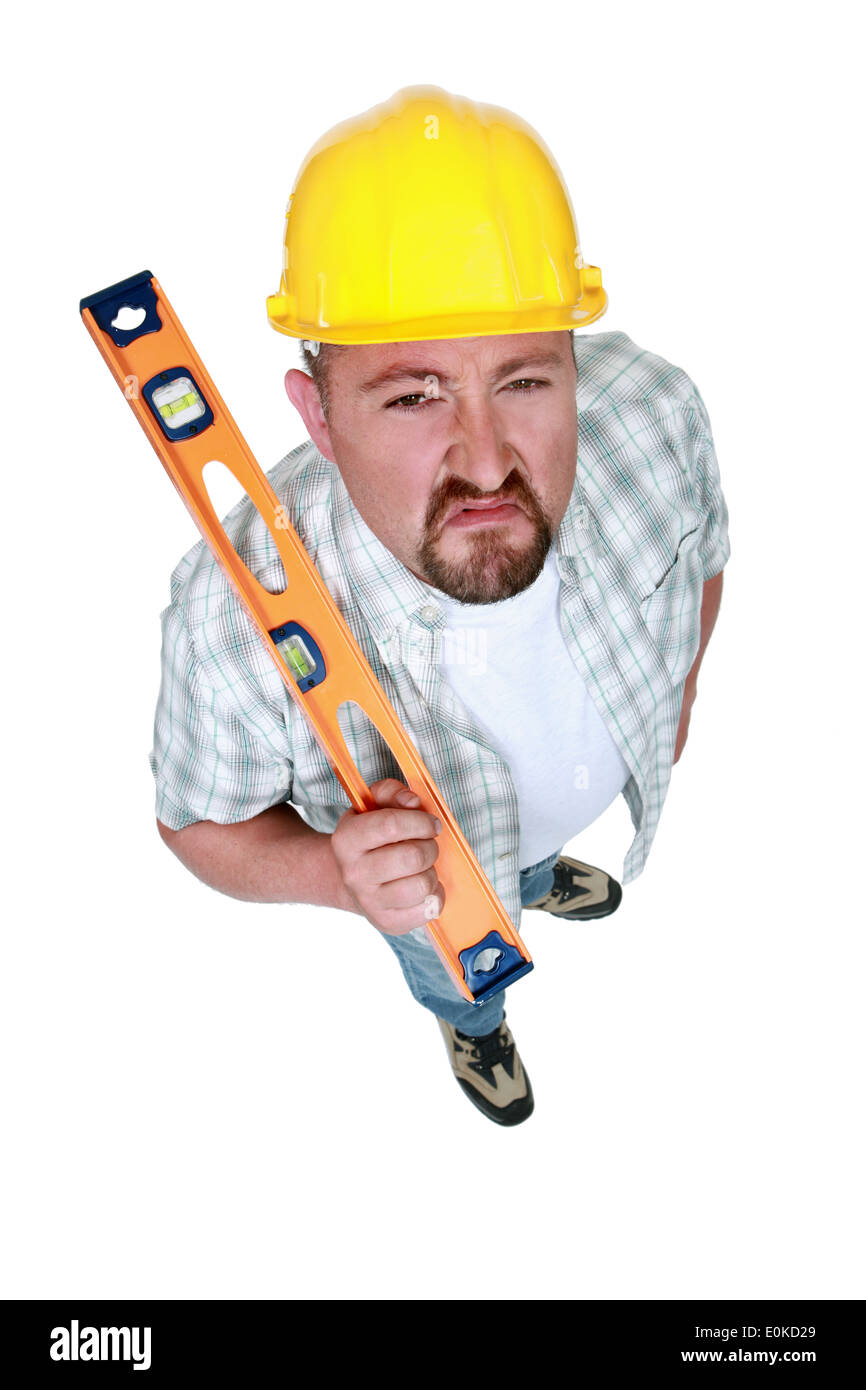 An angry handyman Stock Photo - Alamy