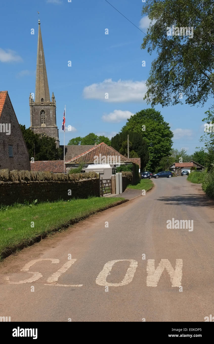 Slow road sign on the approach to St Augustine's Church in Winterbourne ...