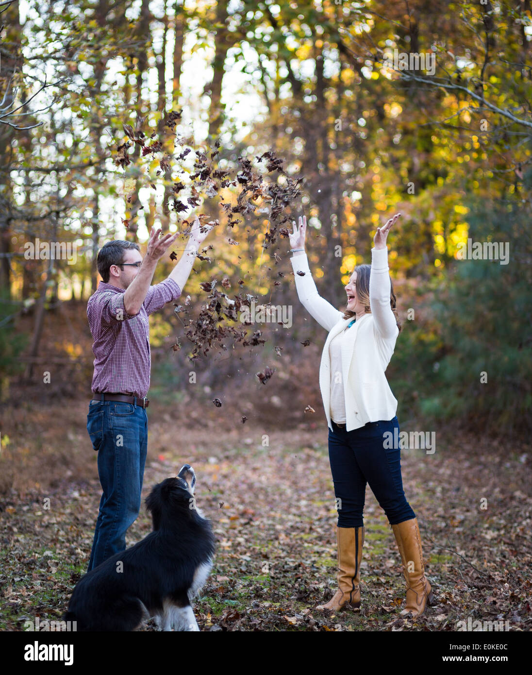 Beautiful happy couple with a dog hi-res stock photography and images ...