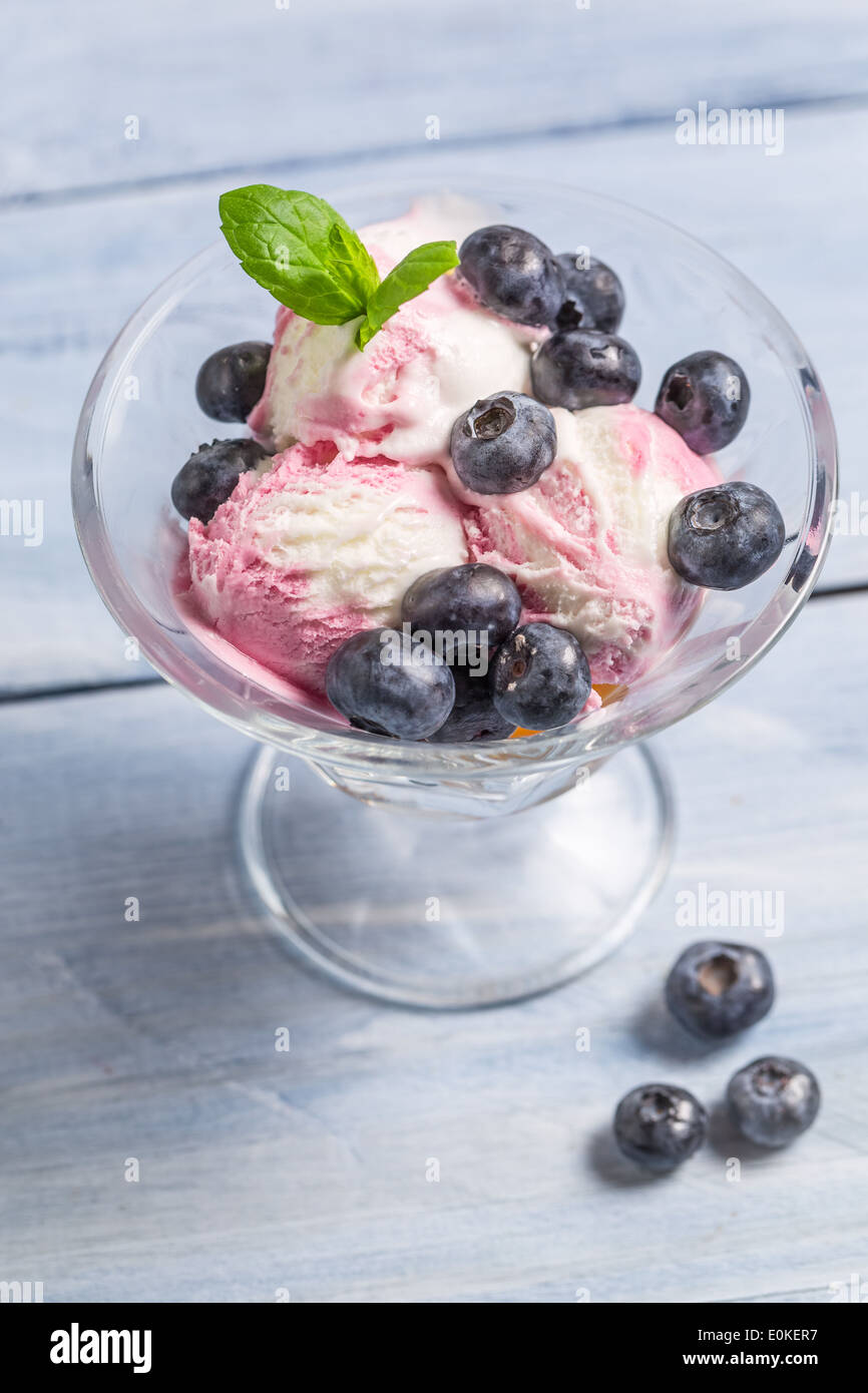 Bowl with blueberry ice cream and leaf mint Stock Photo - Alamy