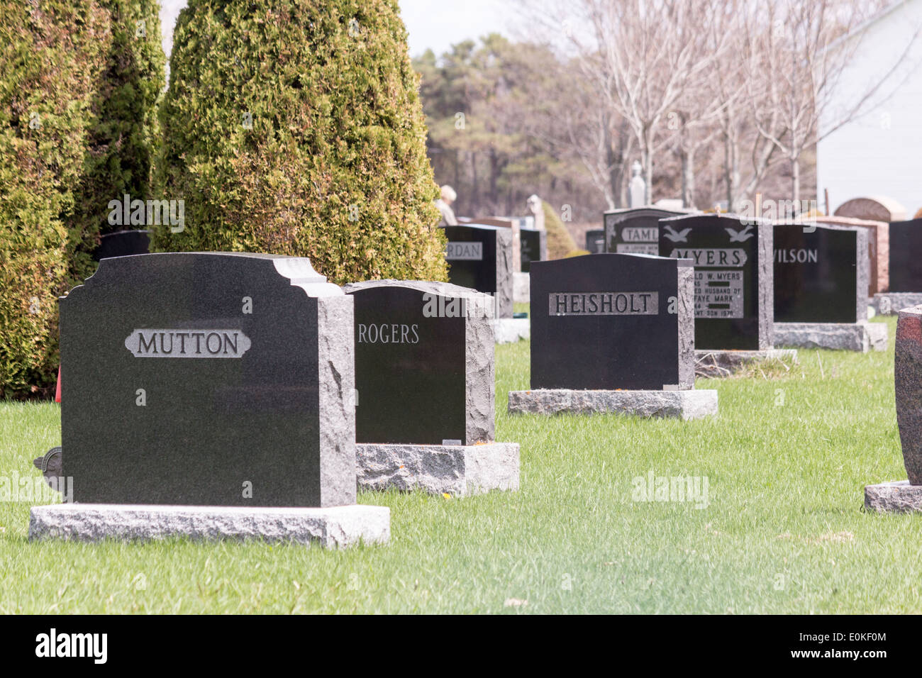 Row of cemetary granite headstones Stock Photo - Alamy