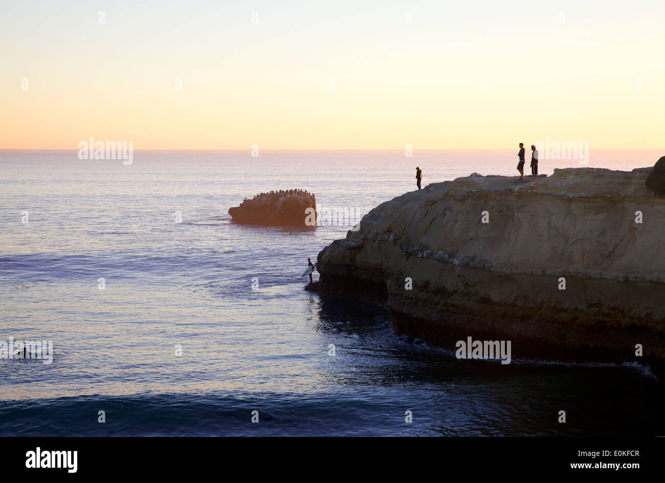 Cliff jump sunset ocean hi-res stock photography and images - Alamy
