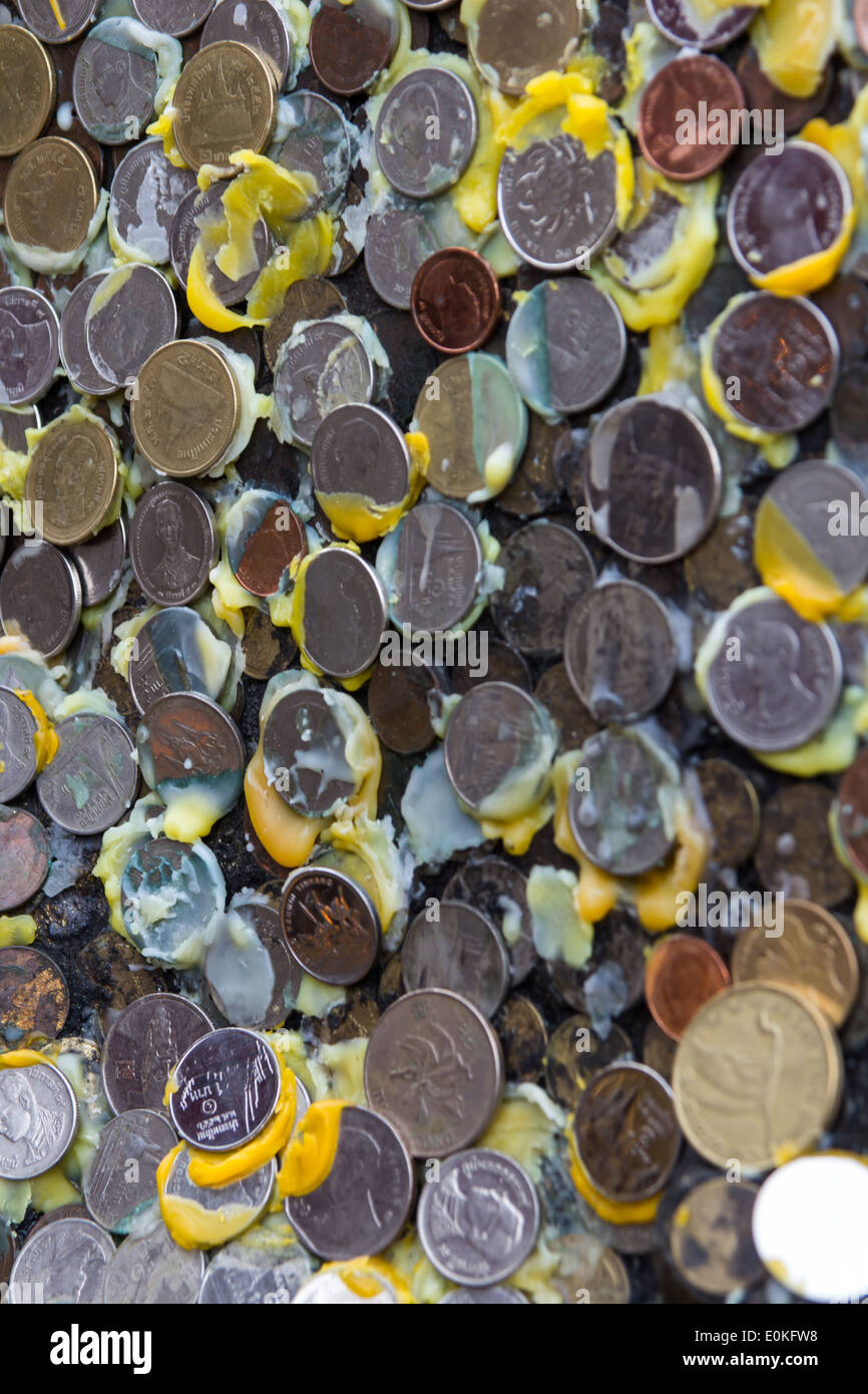 Coins on the wall Stock Photo - Alamy