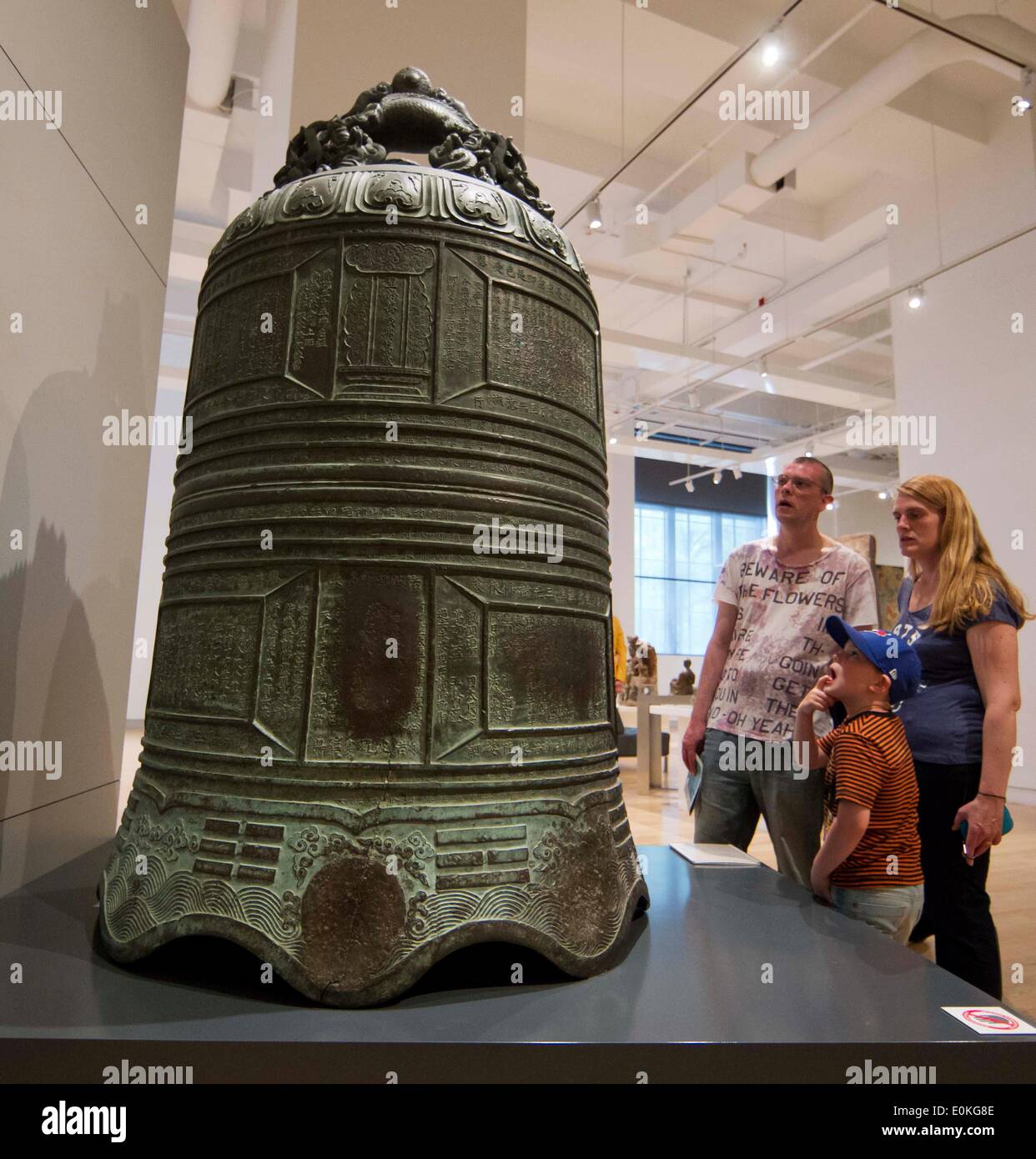 Toronto, Canada. 15th May, 2014. A family look at an ancient Chinese ...