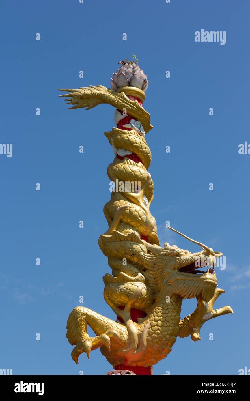 Golden dragon statue in chinese village Stock Photo - Alamy