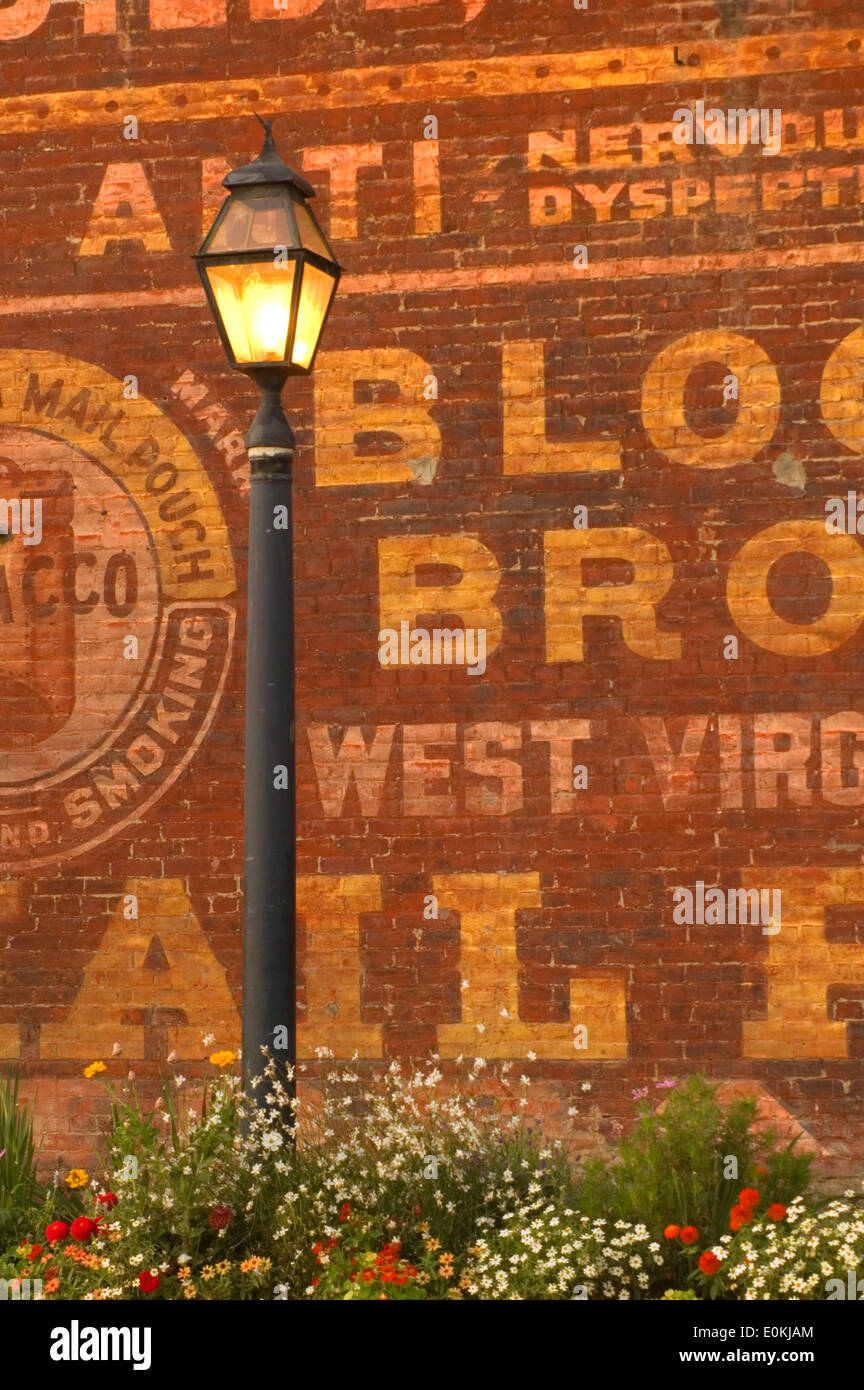 Painted brick advertisement with streetlamp, Jacksonville, Oregon Stock ...