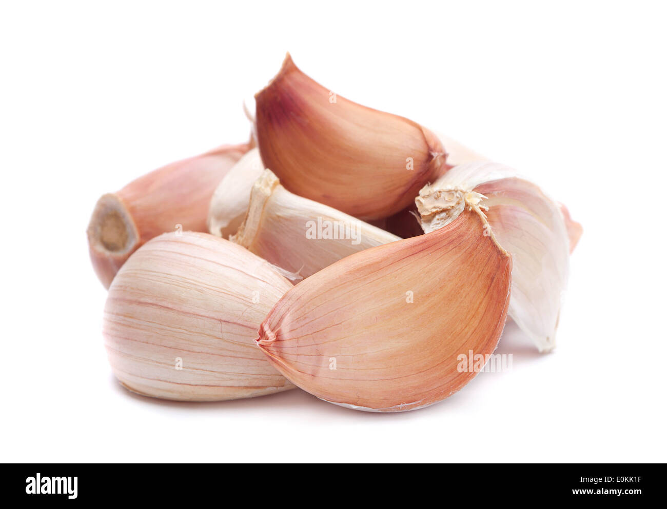 Garlic vegetable closeup isolated on white background Stock Photo - Alamy