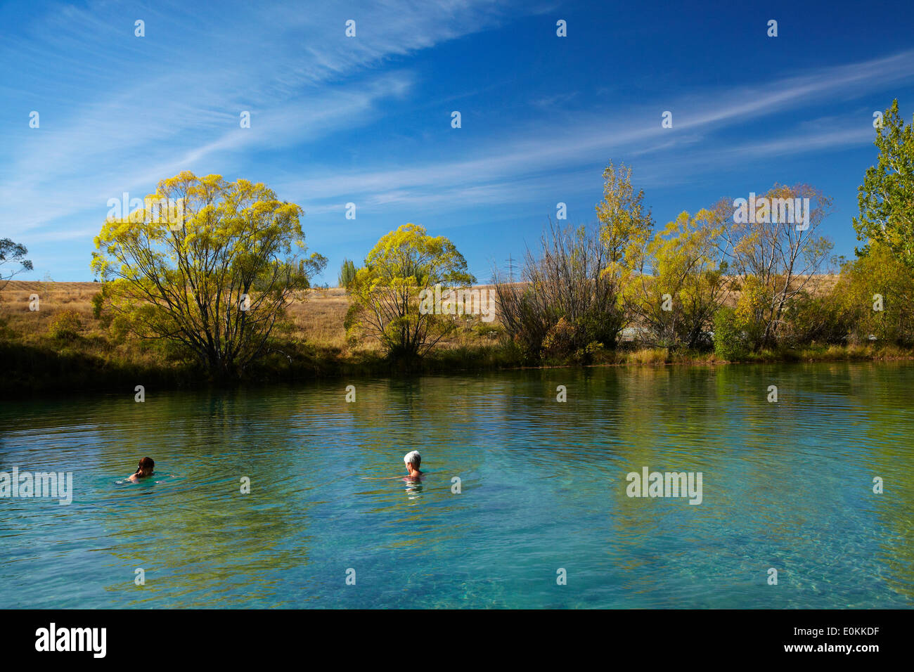 Swimmers and Ohau River in autumn, near Twizel, Mackenzie Country ...