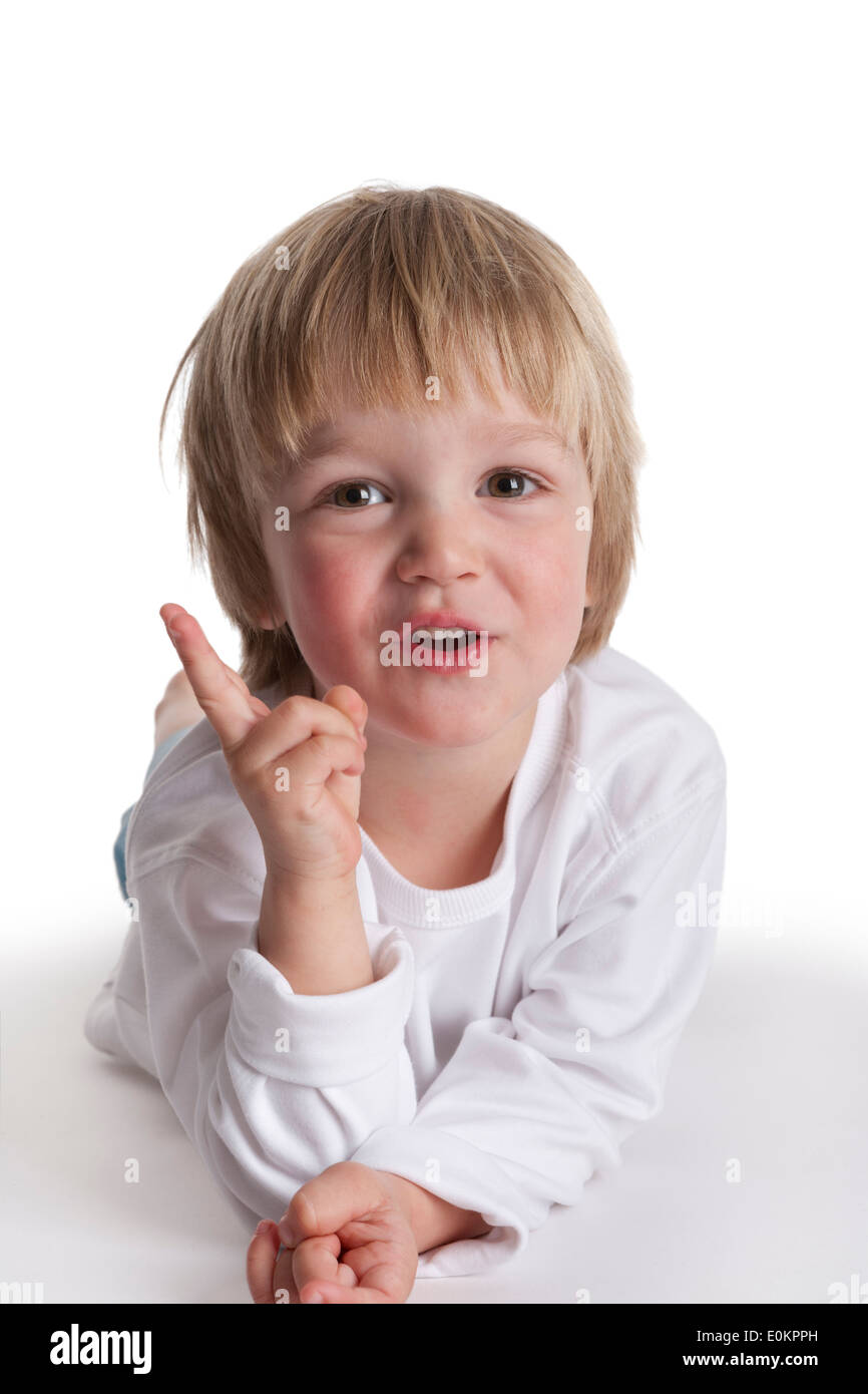 Little boy listening to music n white background Stock Photo - Alamy