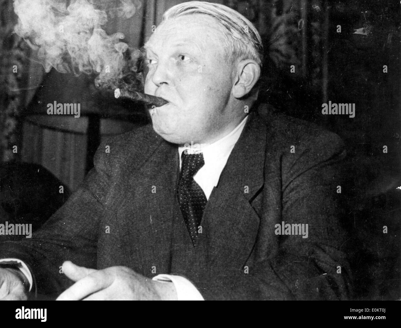 Chancellor Ludwig Erhard smokes a cigar Stock Photo - Alamy