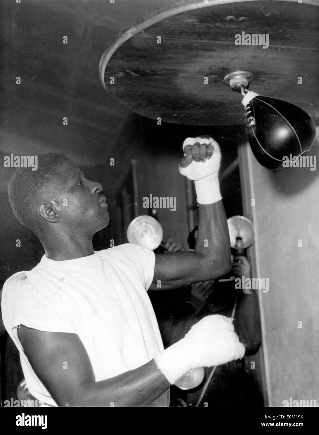 Boxer Percy Bassett training for a fight against R. Famechon Stock ...