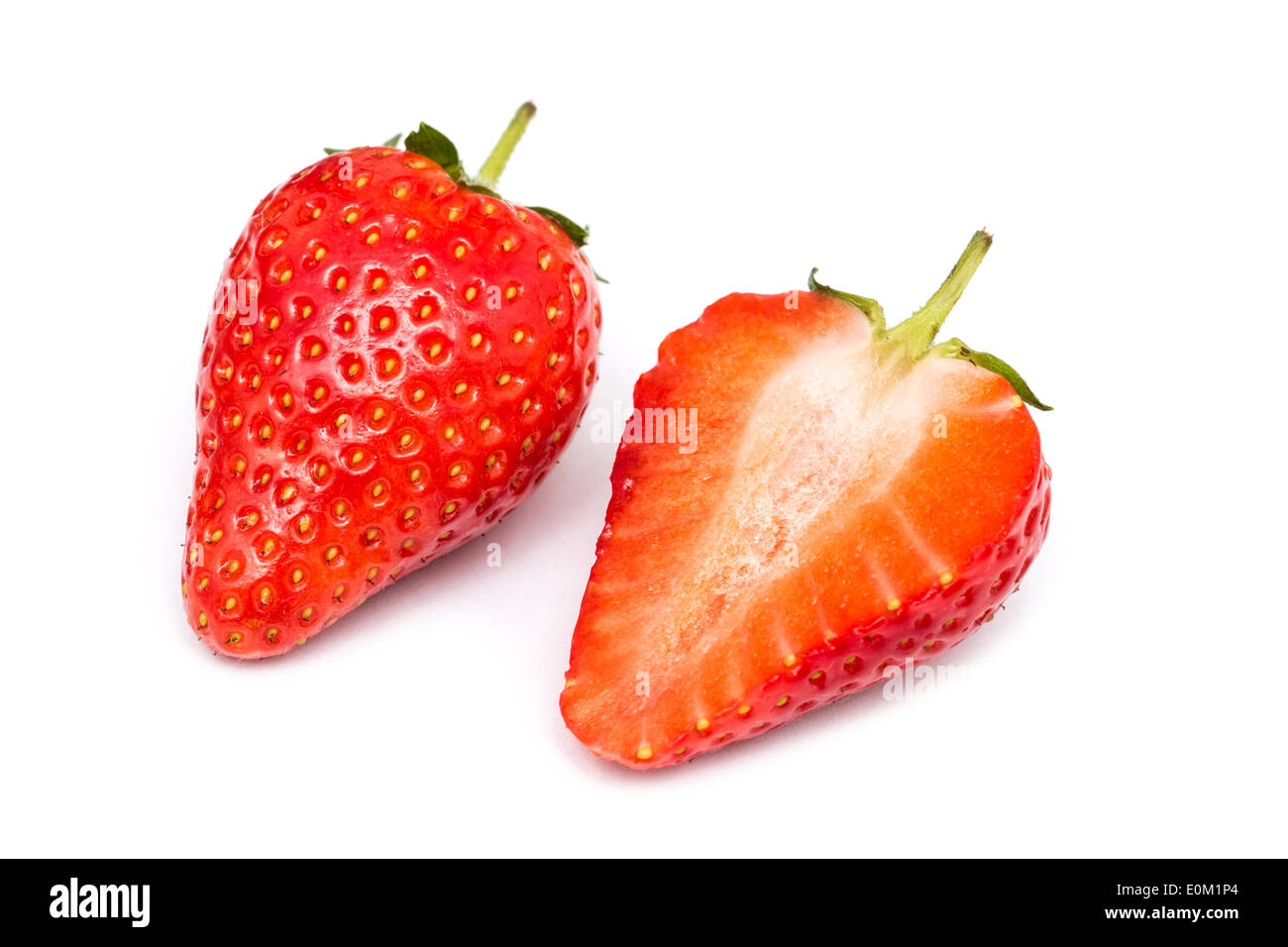 Whole Strawberry And Strawberry Slice Isolated Stock Photo - Alamy