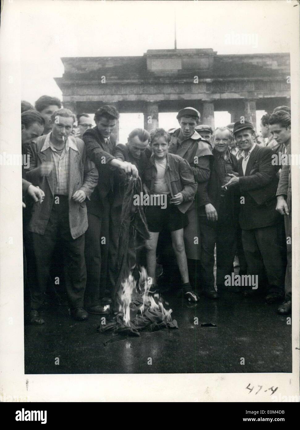 Jun. 17, 1953 - East Berlin workers are pictured here burning a flag of ...