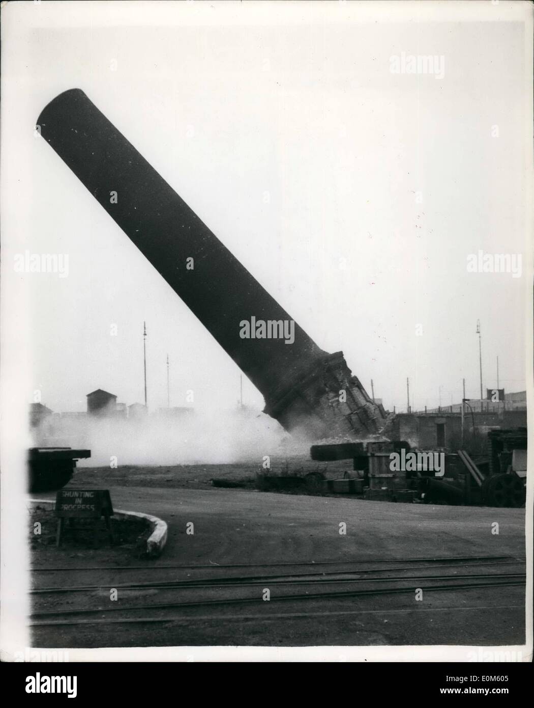 Oct. 10, 1953 - 100-foot chimney stack demolished at silver-town. a 100 ...