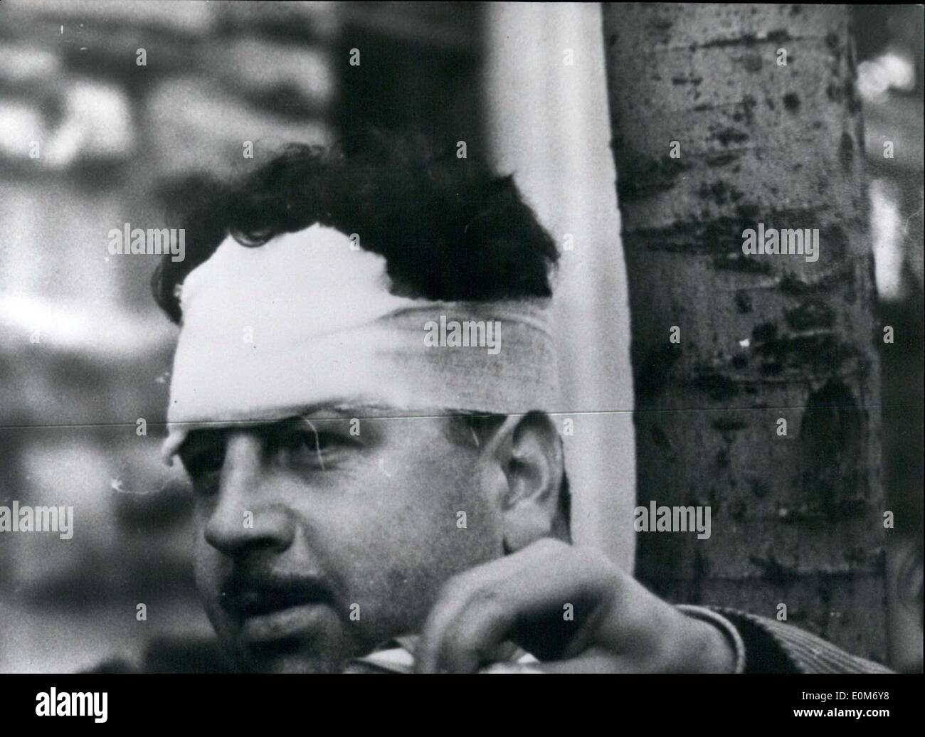 Nov. 11, 1953 - A wounded Italian during the street-fights Stock Photo ...