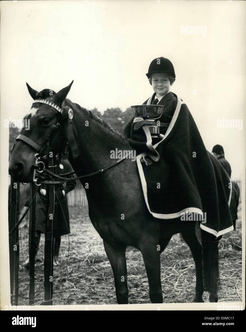 Jun. 06, 1954 - Richmond Horse Show.: Photo shows a proud young winner ...