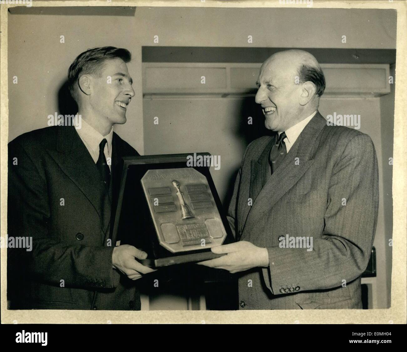 Apr. 04, 1955 - Dr. Roger Bannister receives helms trophy at variety ...