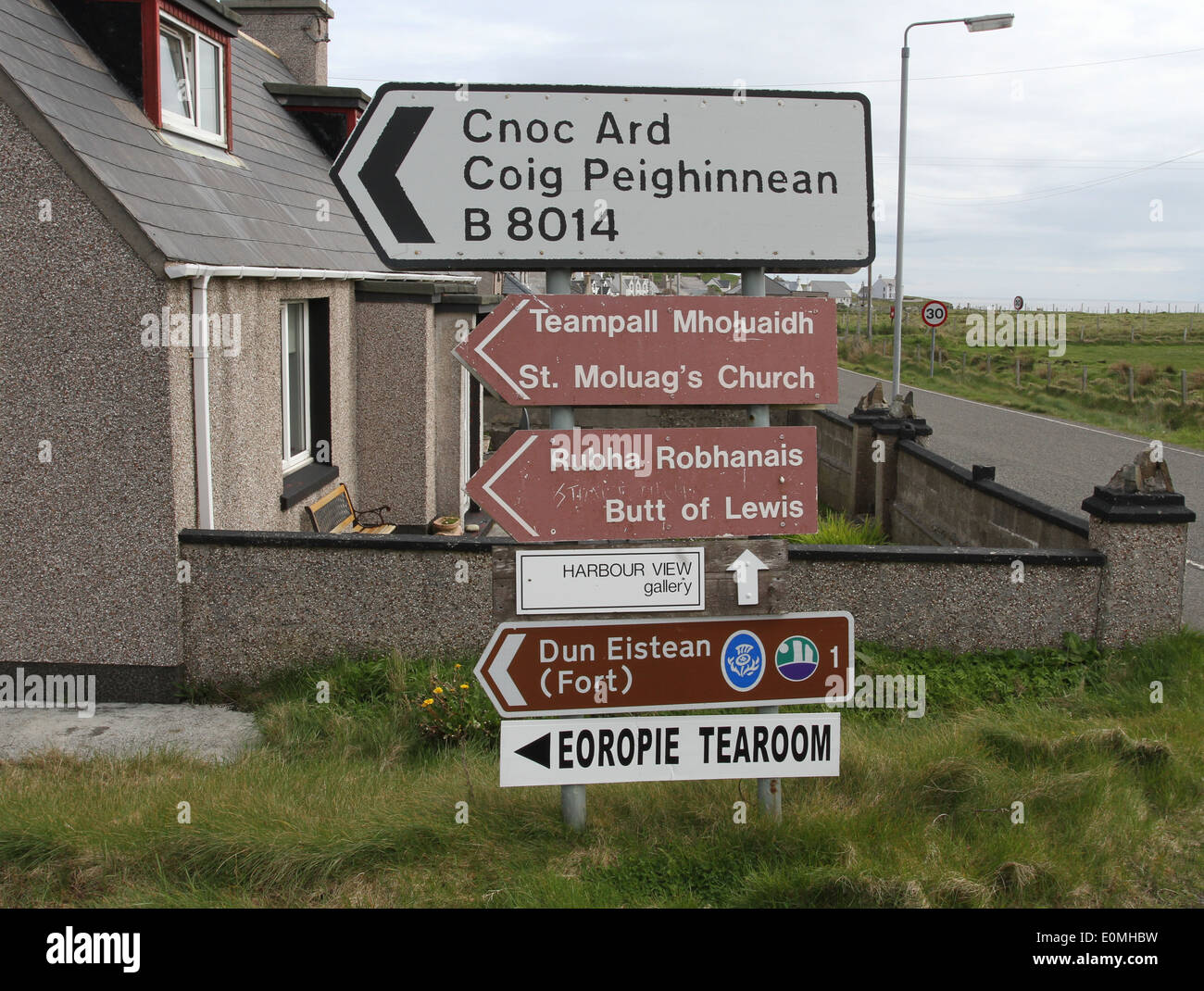 Bilingual sign Port of Ness Isle of Lewis Scotland May 2014 Stock Photo ...