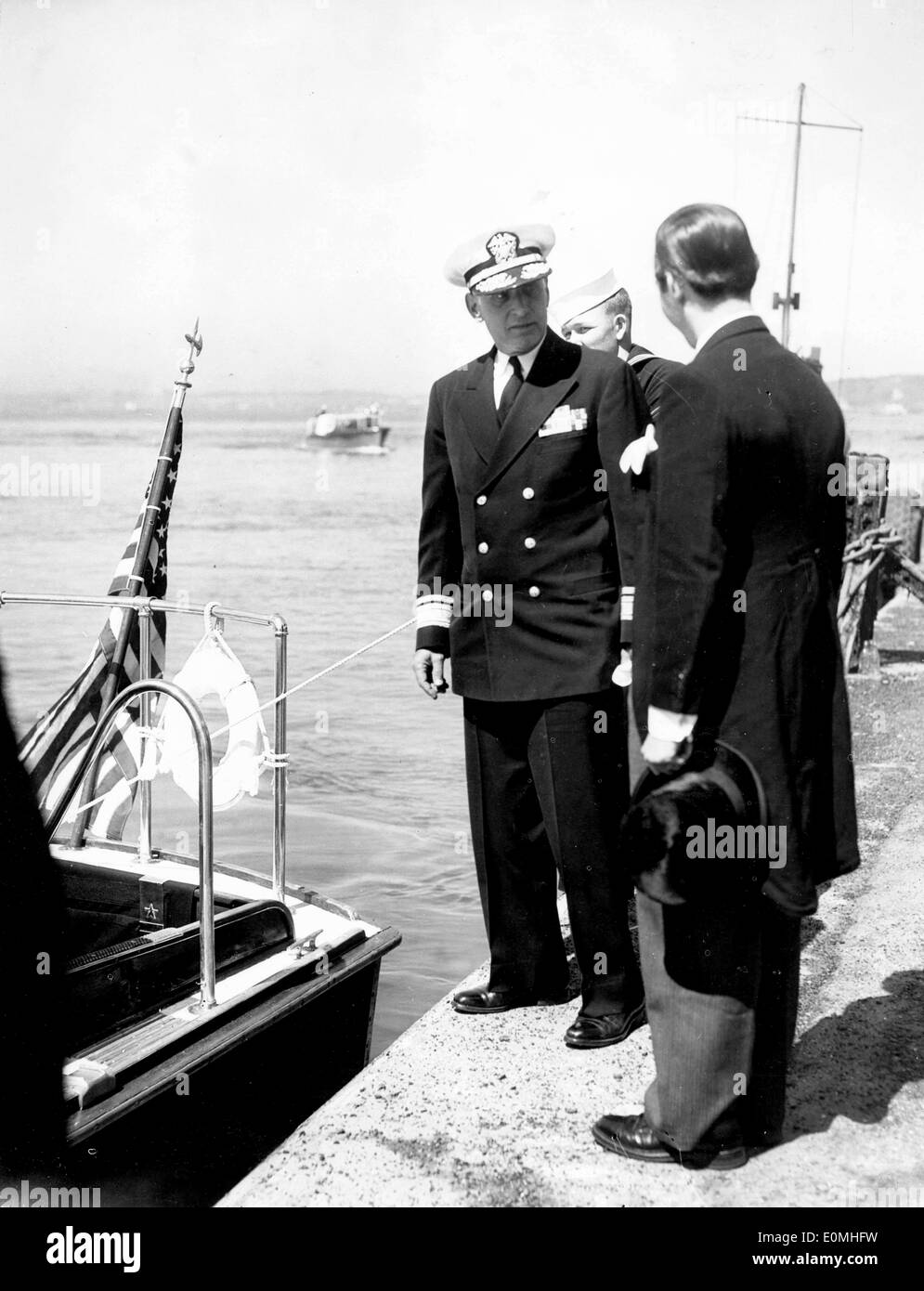 Jul 27, 1955; Green Bay, WI, USA; Rear Admiral WILLIAM AMMON chats to ...