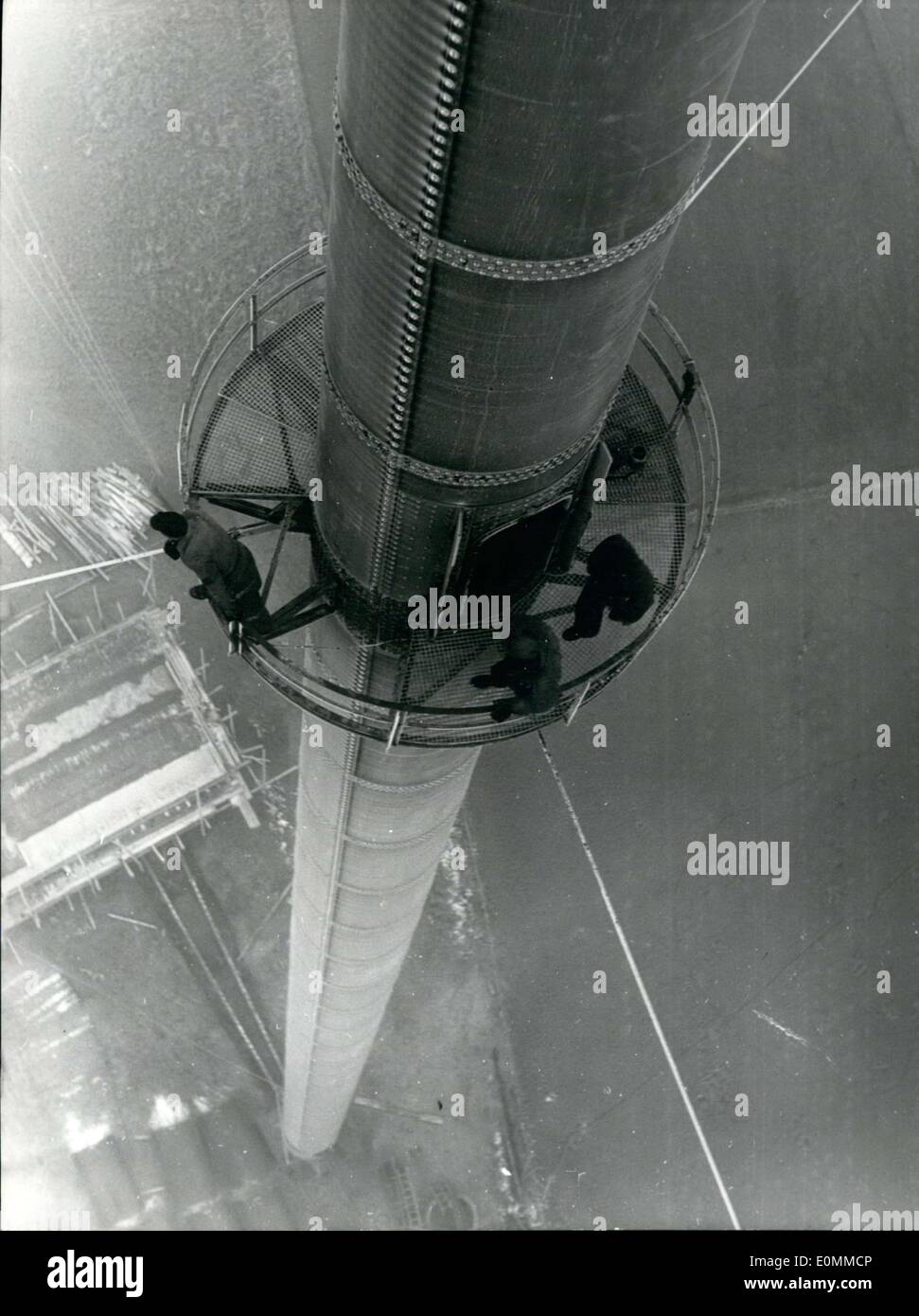 Dec. 12, 1955 - These reporters are going to get vertigo... Pictured is ...