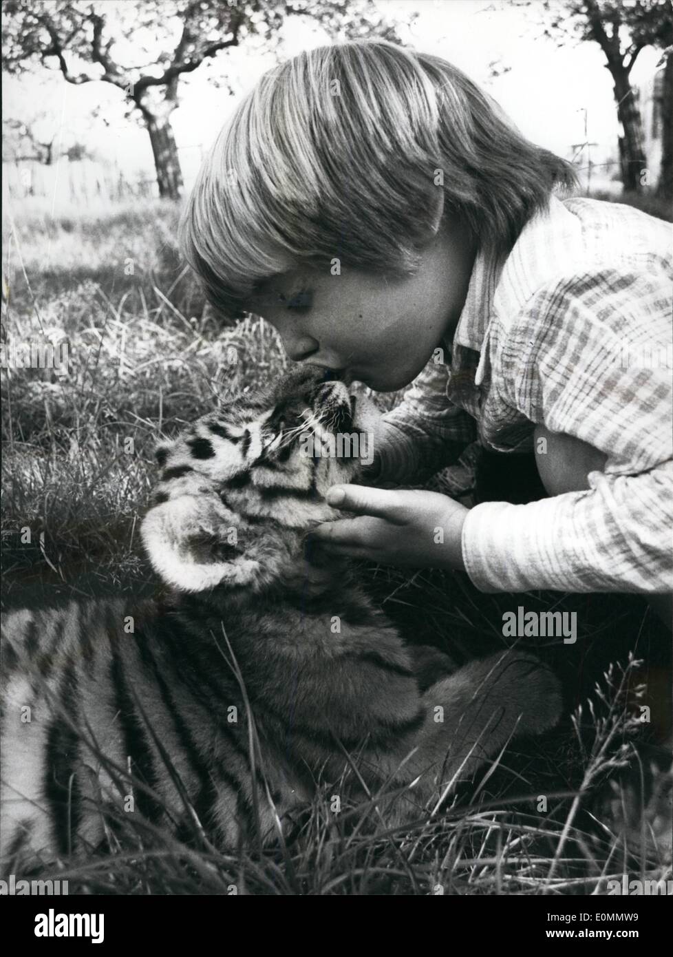 Mar. 03, 1956 - Smacker: Bassa shows a loving touch with his playmate in the grounds of the ...