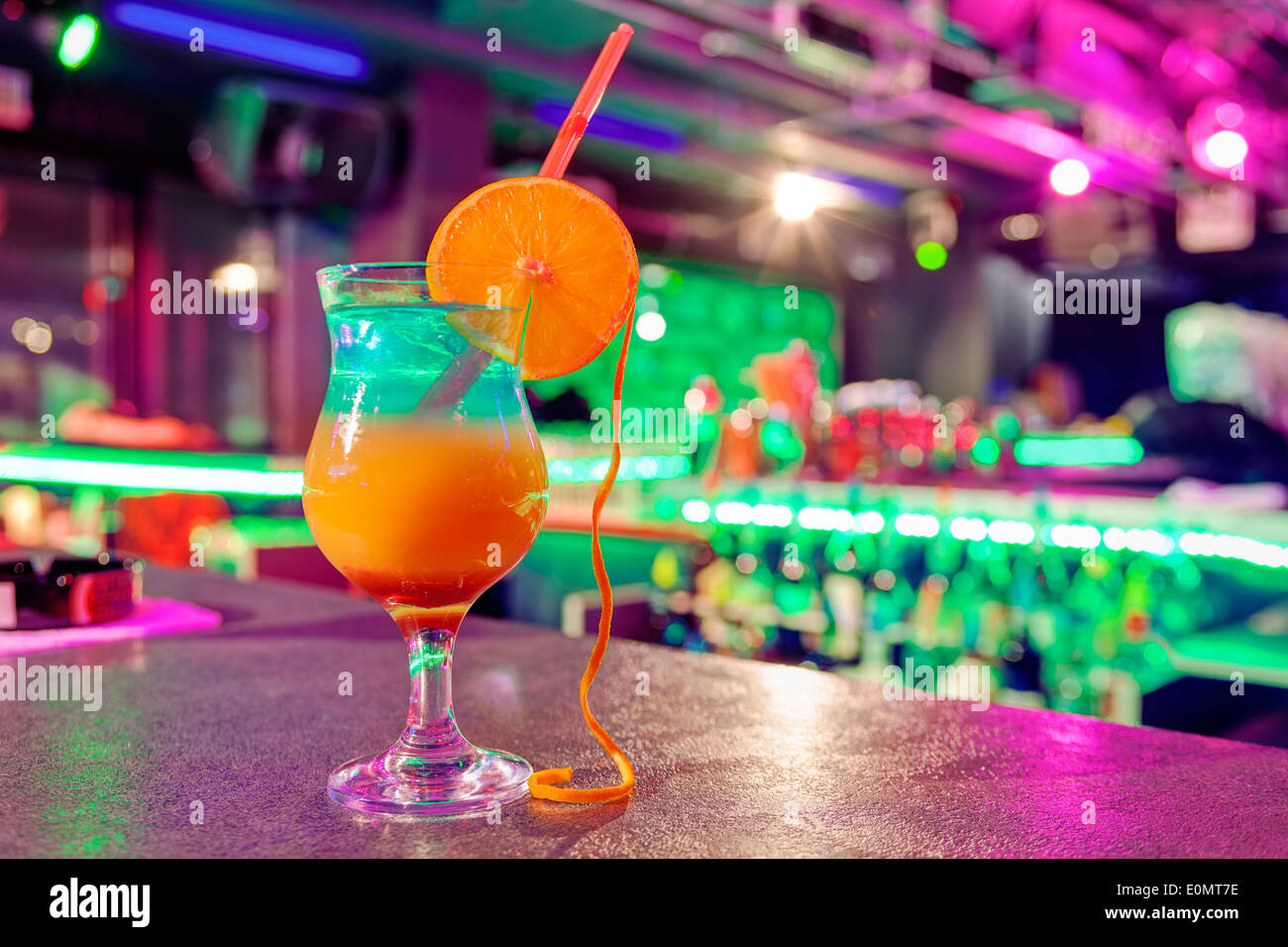 cocktail at bar in a night club with vivid colors Stock Photo - Alamy