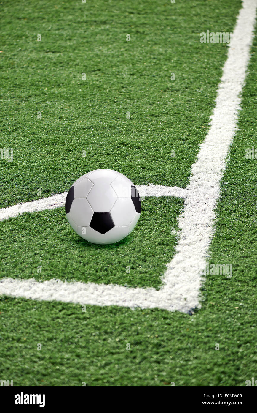traditional soccer ball on green soccer field Stock Photo - Alamy