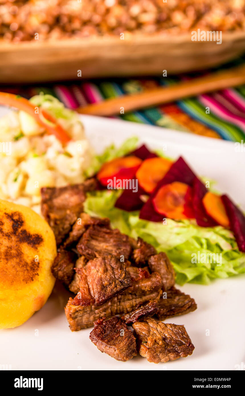 fritada, fried pork, traditional ecuatorian dish Stock Photo - Alamy