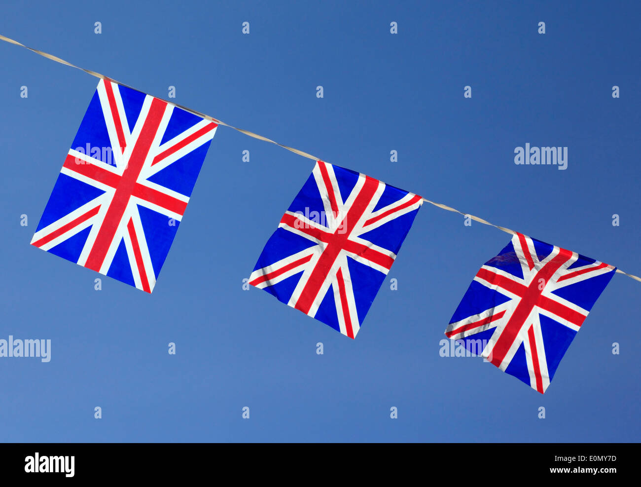 Clear blue summer sky union jack hi-res stock photography and images ...