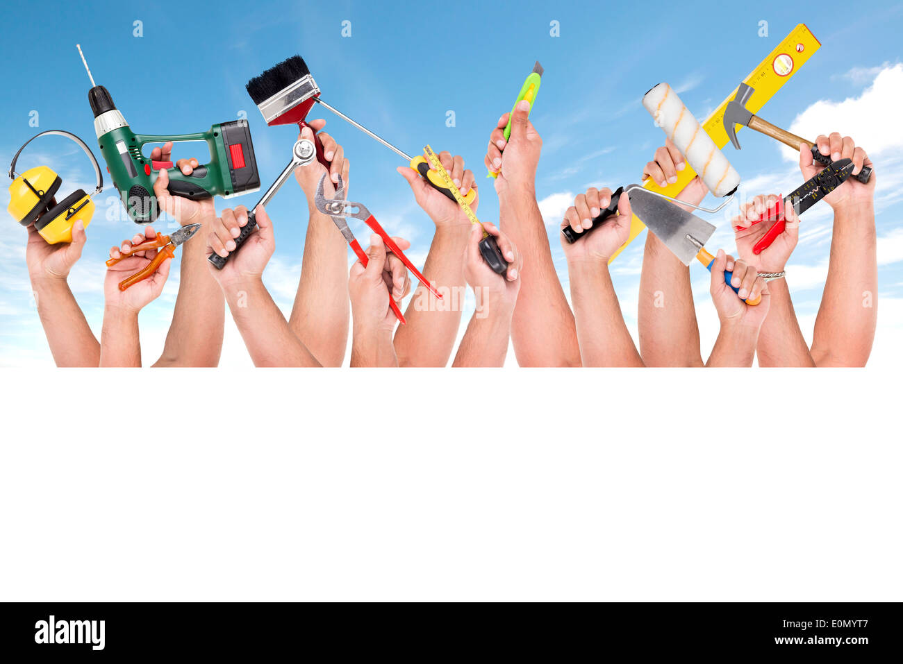 Several hands with construction tools Stock Photo - Alamy