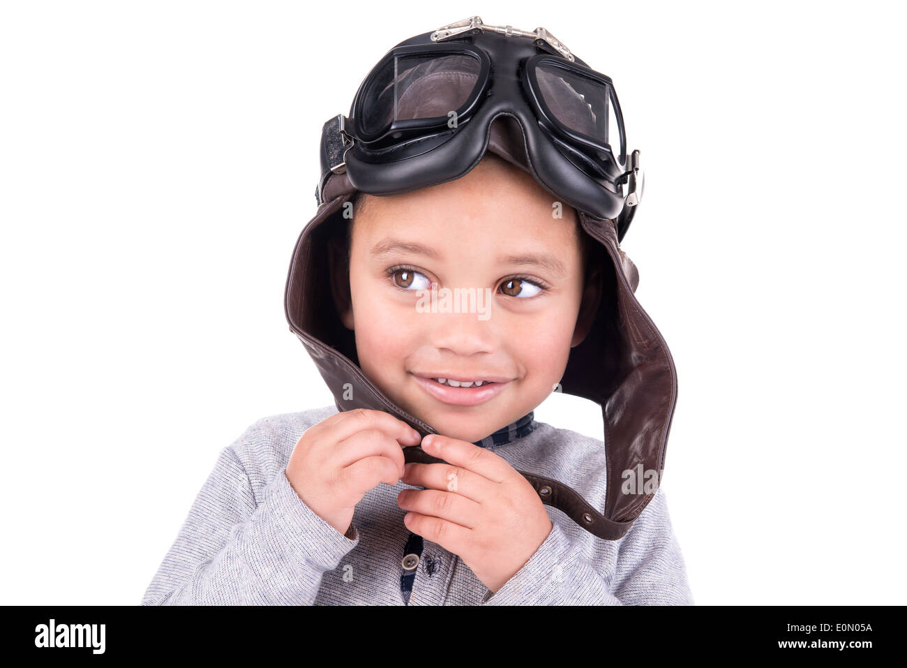 Young boy with pilot helmet isolated in white Stock Photo - Alamy