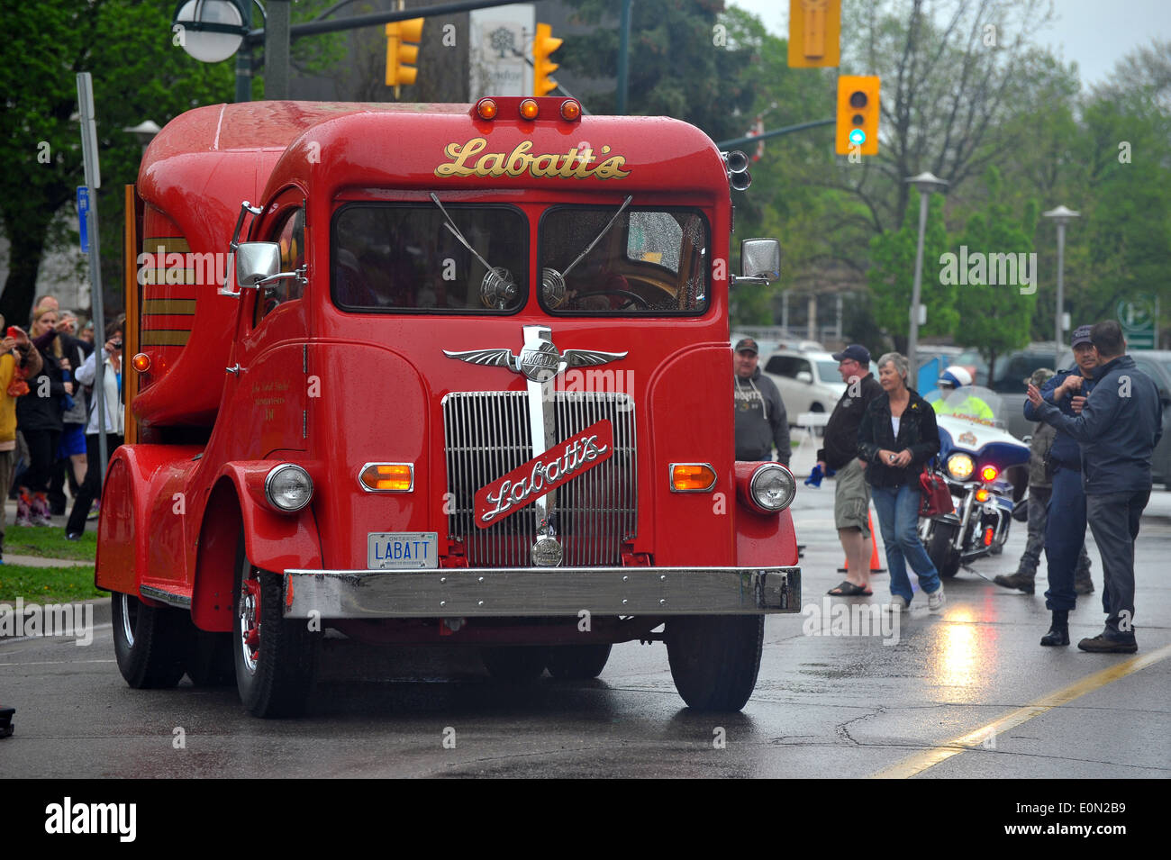 A vintage red Labatt beer lorry carrying the Memorial Cup trophy on the ...