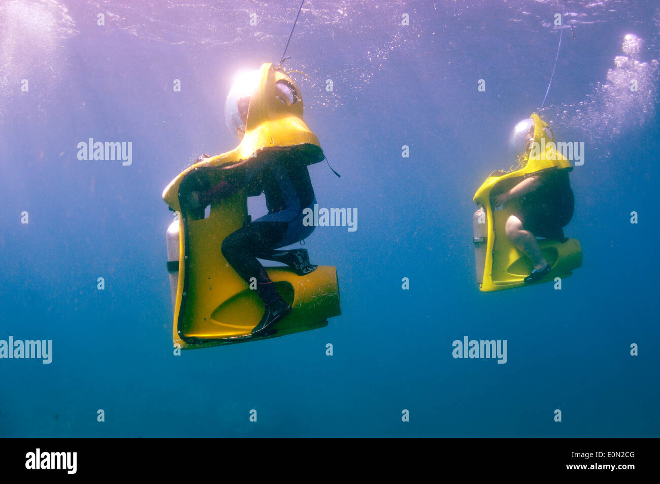 Two BOB "The Breathing Observation Bubble" scooter divers underwater in ...