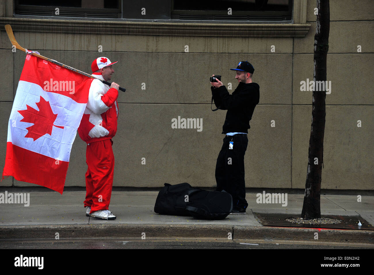 Canadian man holding canadian flag hi-res stock photography and images ...