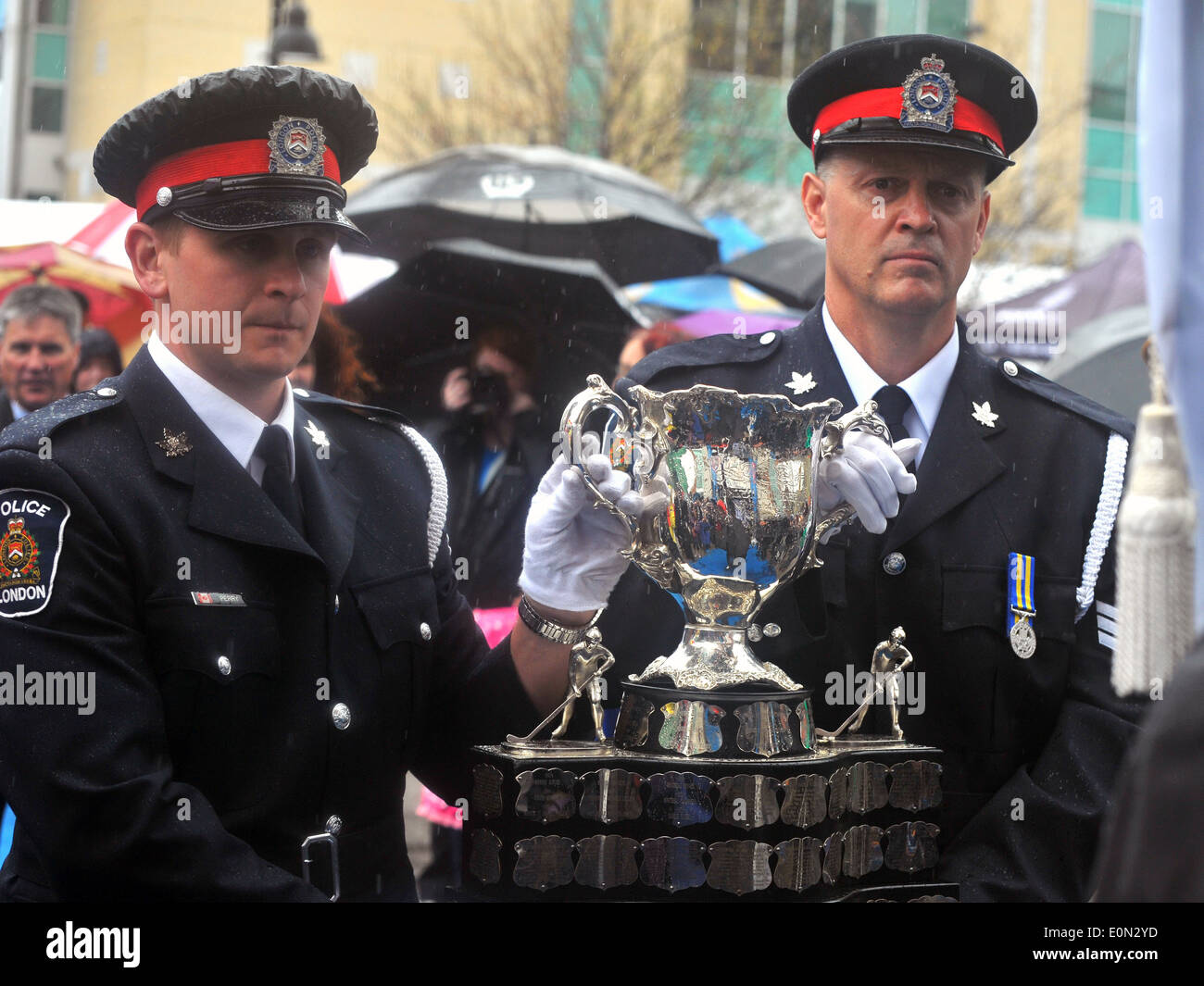 London Ontario police officers stand with the Memorial Cup trophy Stock ...