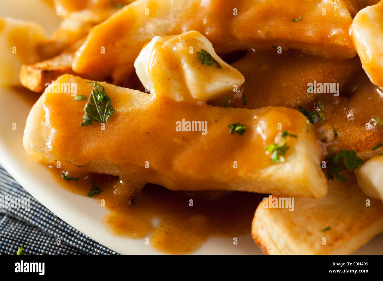 Poutine canada eating hi-res stock photography and images - Alamy