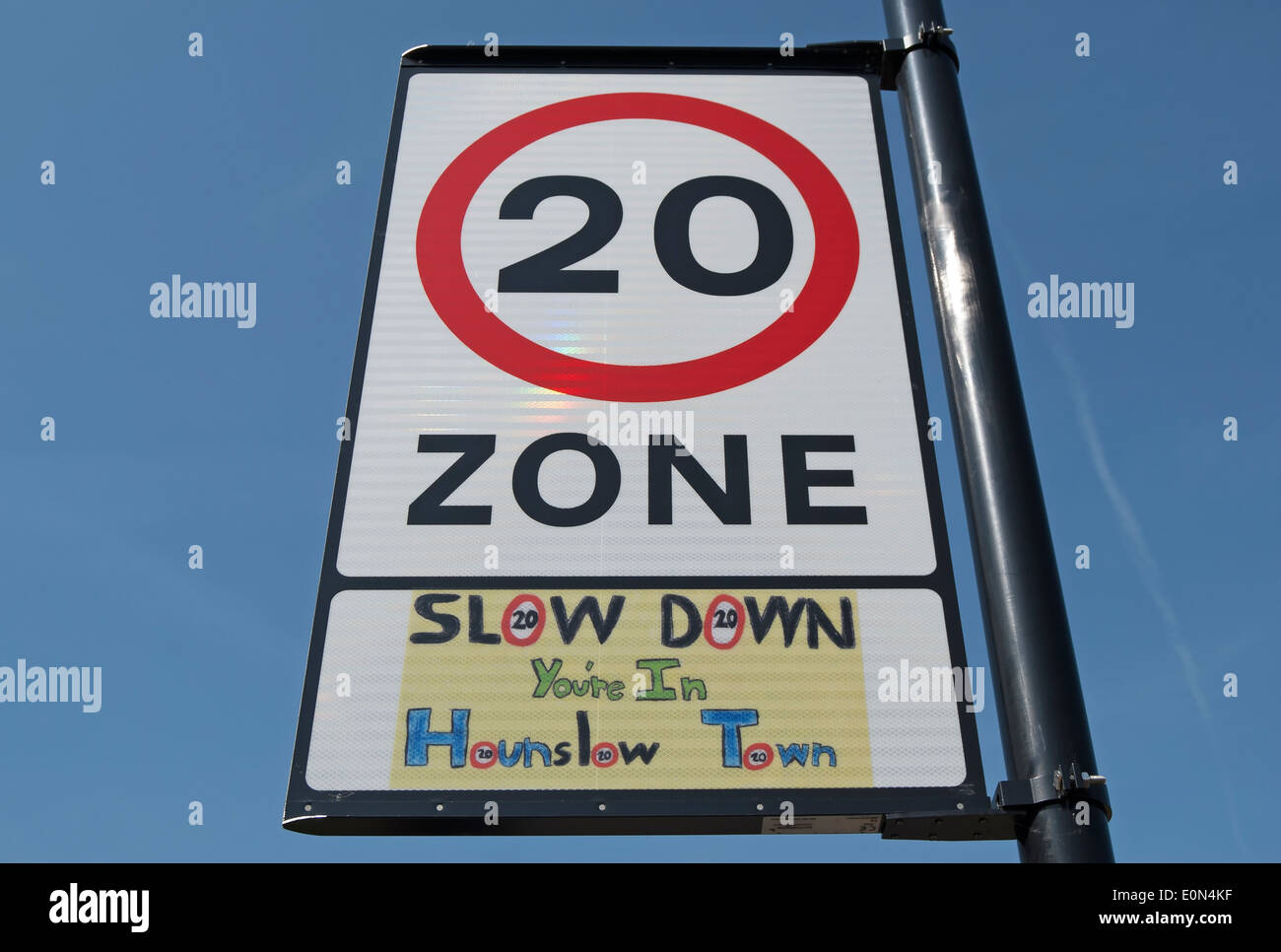 british road sign indicating 20mph zone with local wording beneath ...