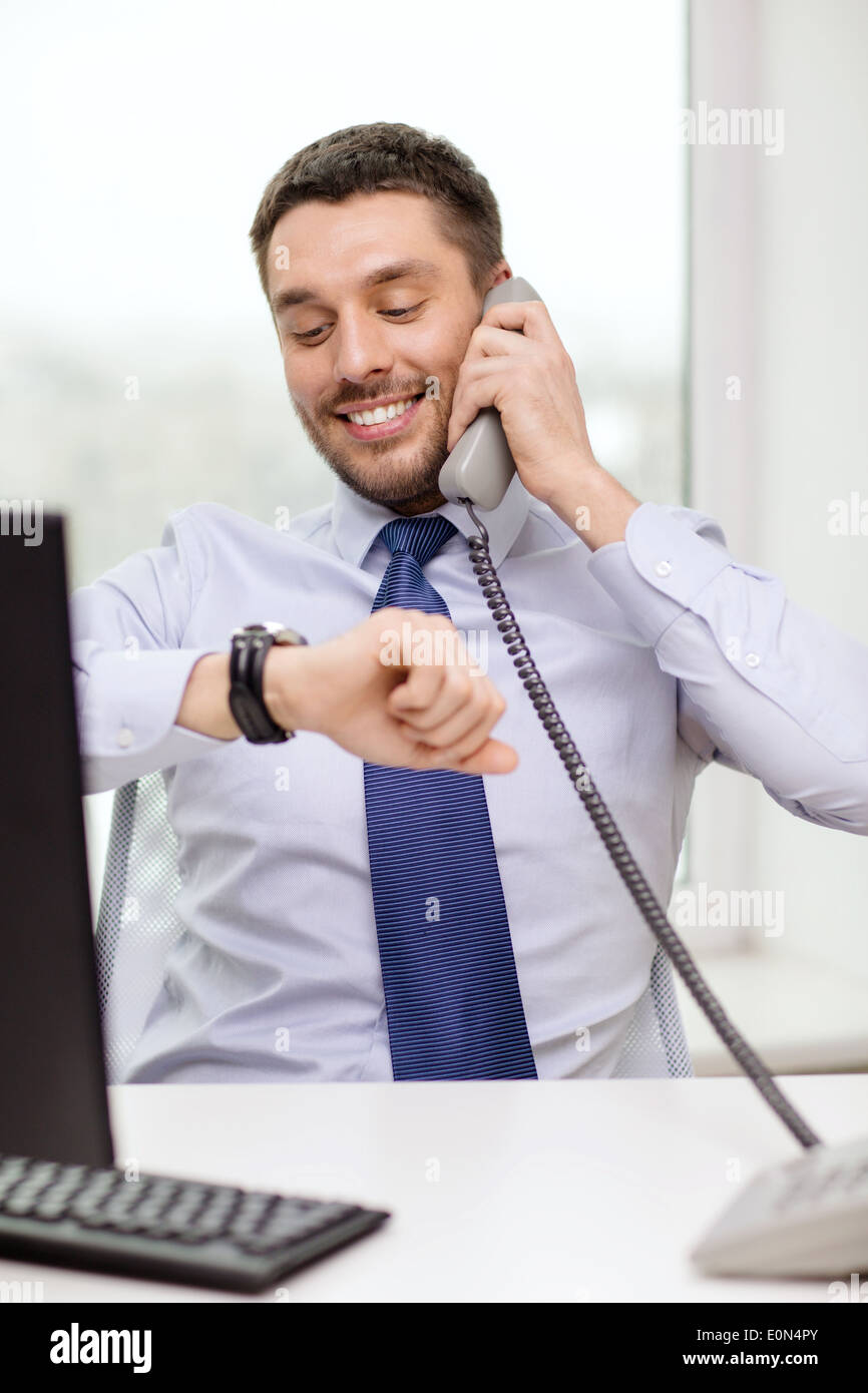 Handsome worker making call sitting hi-res stock photography and images ...