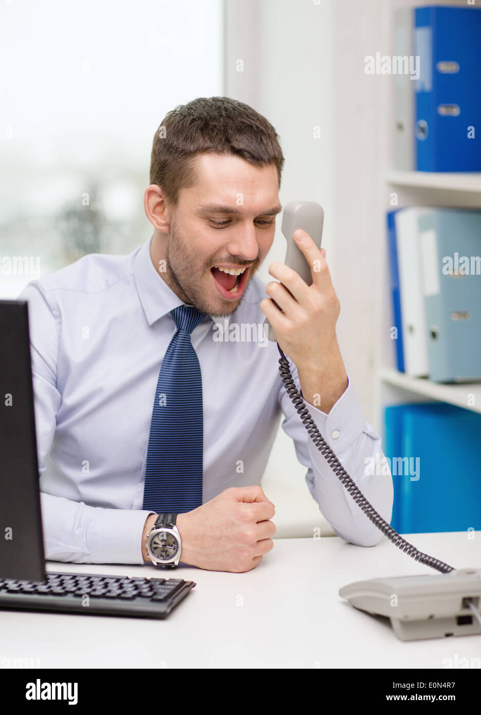 Angry emotional businessman talking hi-res stock photography and images ...