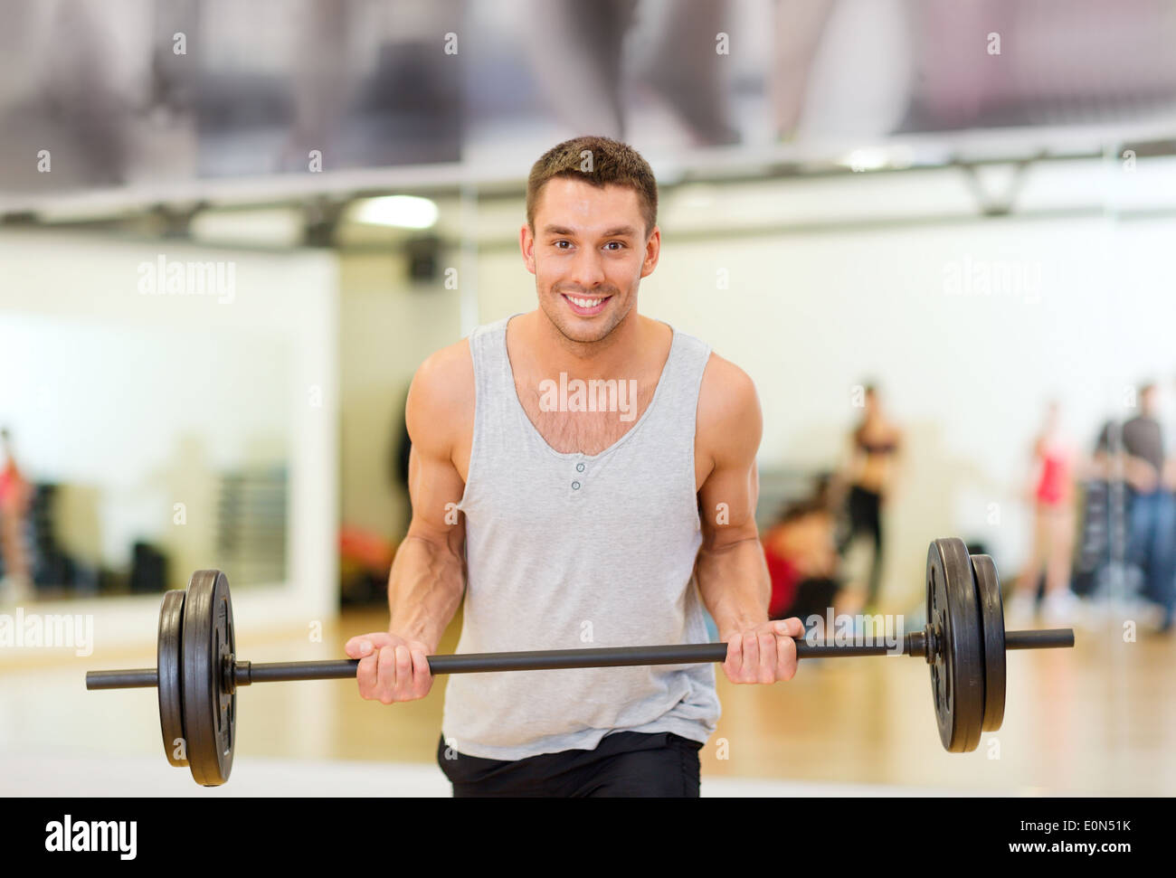 Strong male bodybuilder barbell hi-res stock photography and images - Alamy