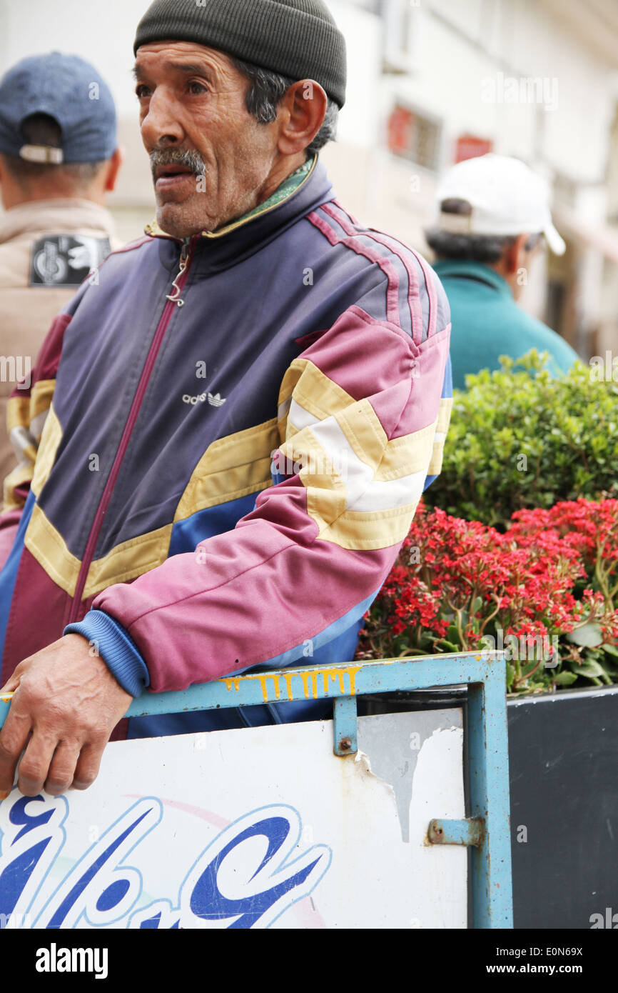 Traditional old Moroccan male in Tangier Morocco selling flowers Stock ...