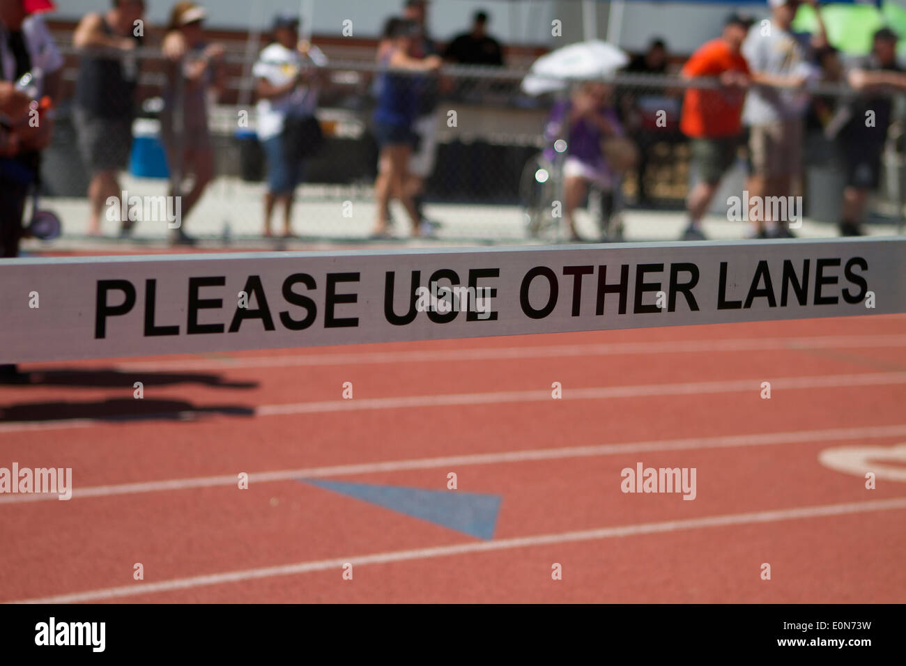 running track sign "please use other lanes Stock Photo - Alamy